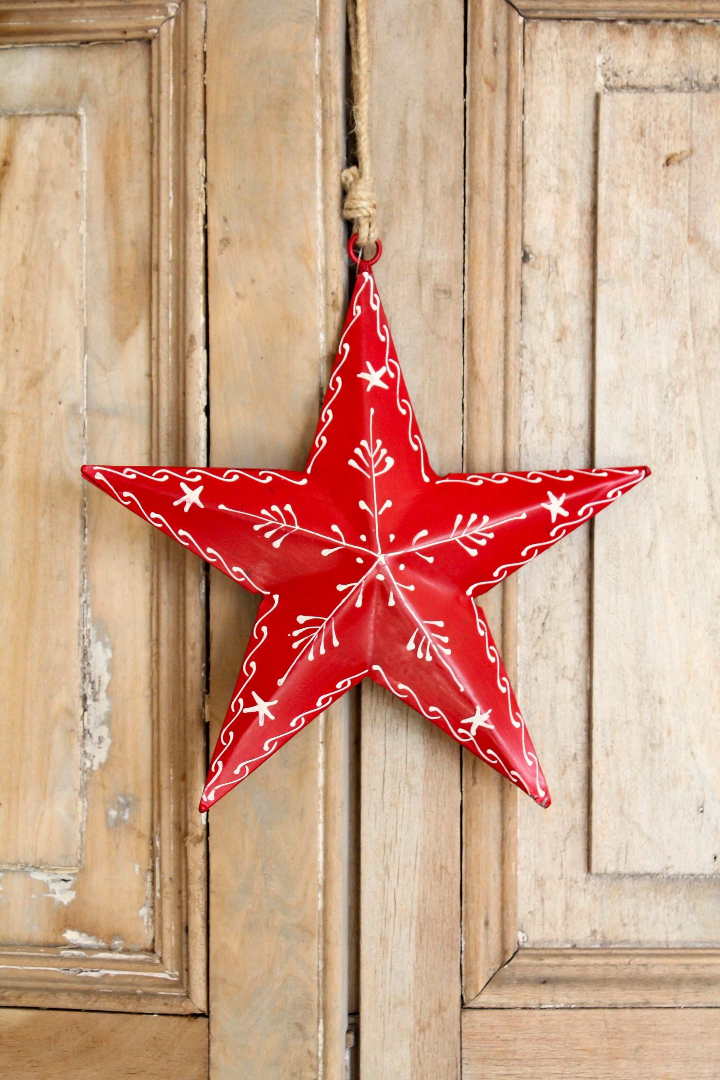 Estrella Latón Indu Roja – La Batea Deco