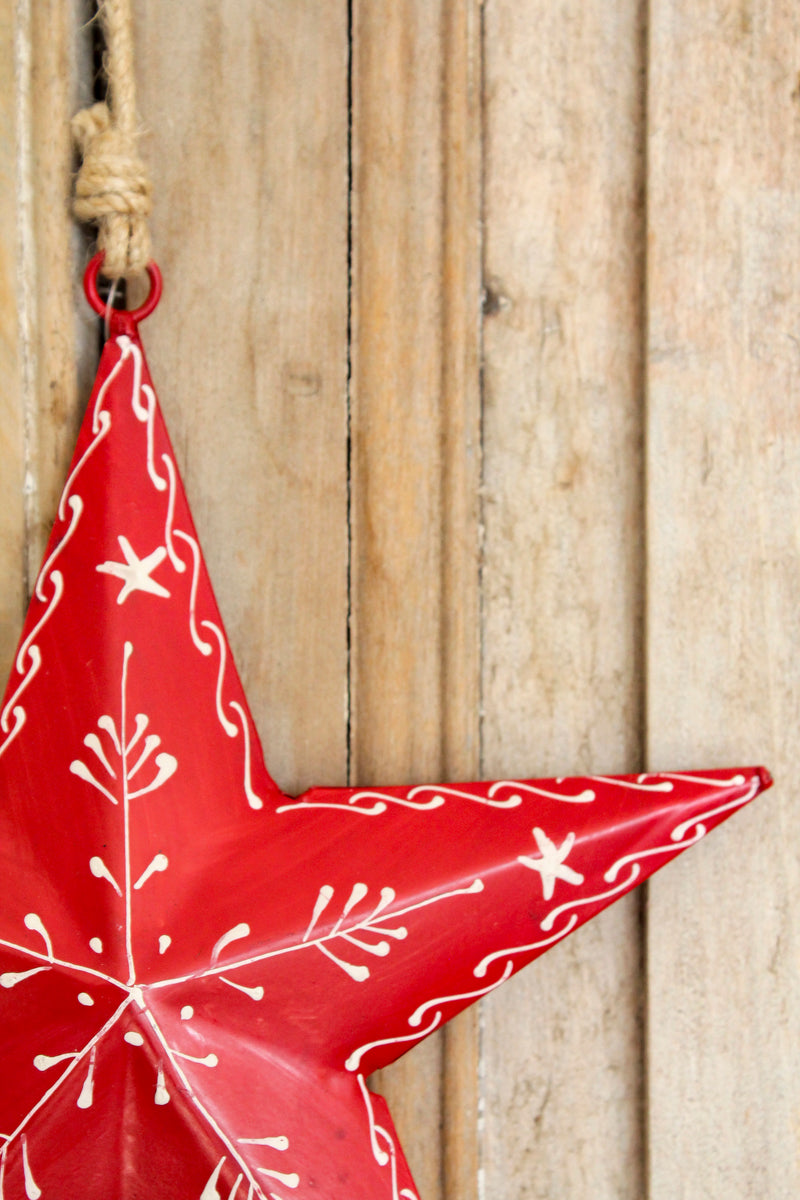 Estrella Latón Indu Roja – La Batea Deco